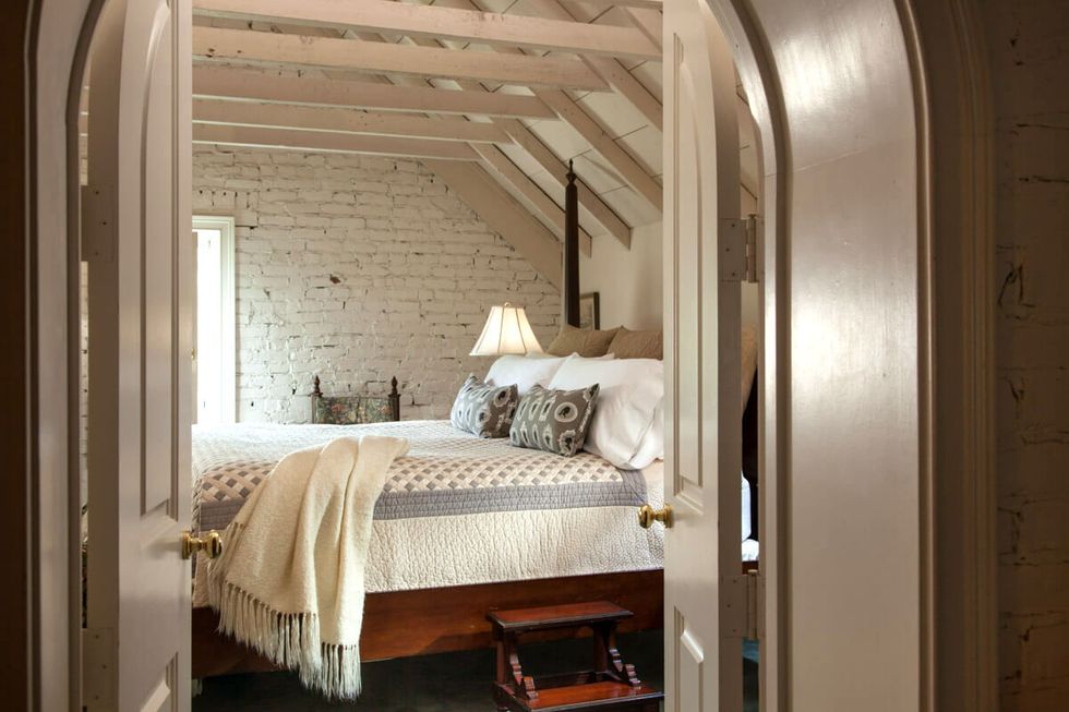 This Gothic Revival inn looks like something from a magazine and it's ...