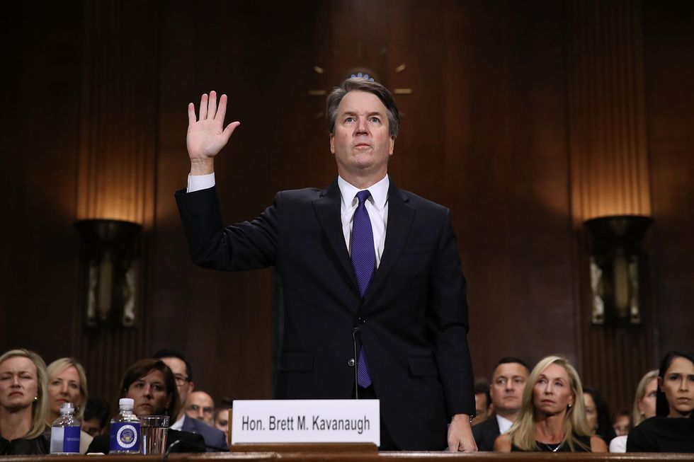 Man claims Kavanaugh threw beer in man's face during bar fight. Then ...