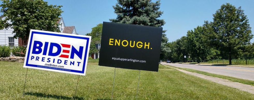 Man hangs a giant 'Trump Lost LOL' flag in a conservative neighborhood ...
