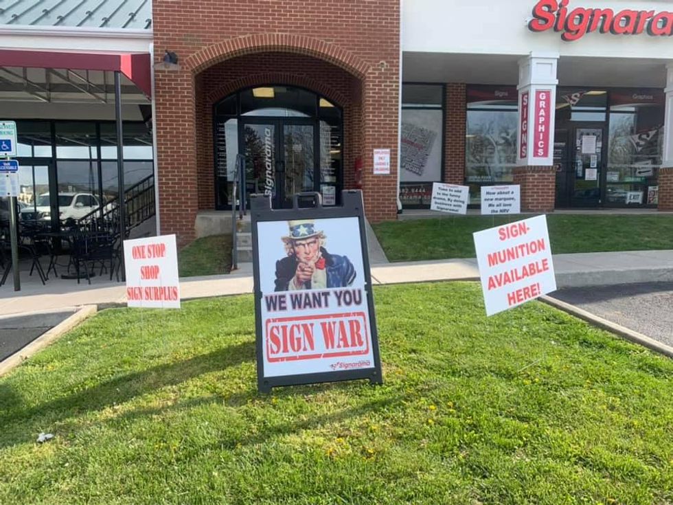 Local businesses in a Virginia town are having a 'sign war' and it's ...