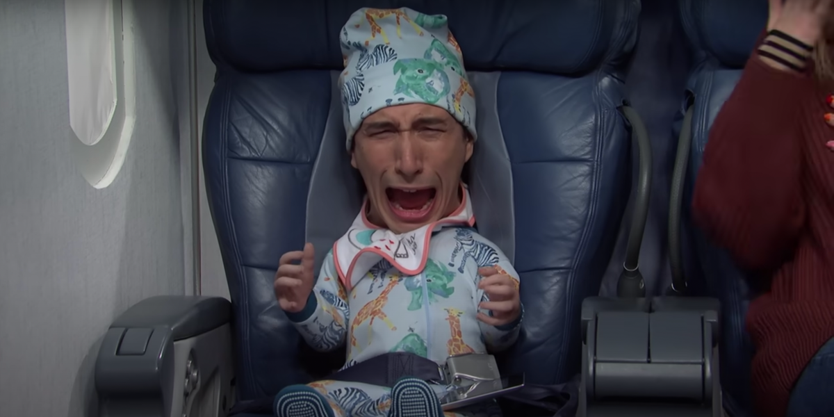Adam Driver plays baby on an airplane for 'SNL' - Upworthy