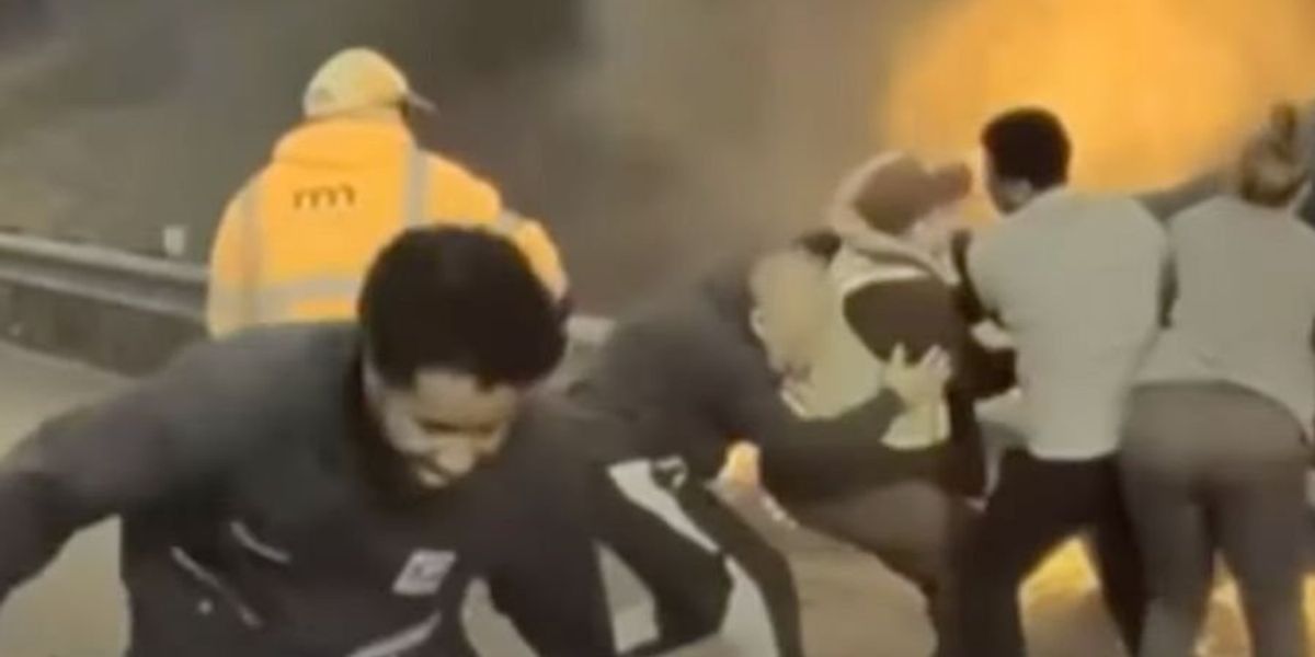 Video shows strangers trying to free man from burning car - Upworthy