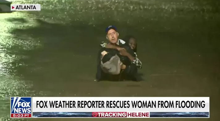Fox weatherman bravely rescues trapped motorist in hurricane - Upworthy