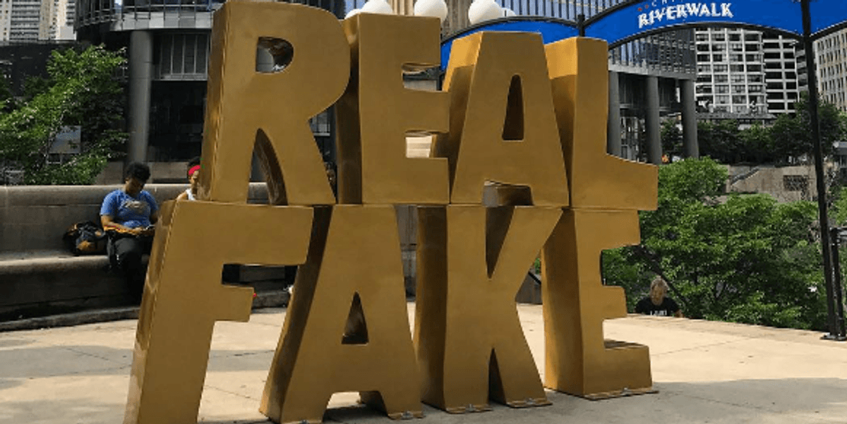 There is Now a Gold, Gleaming 'Real Fake' Statue Outside Chicago's ...