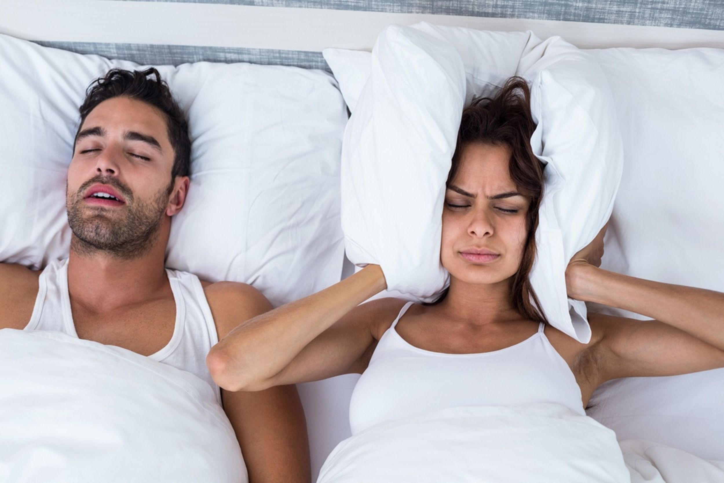 The 5 Stages Of Sleeping Next To A Snorer