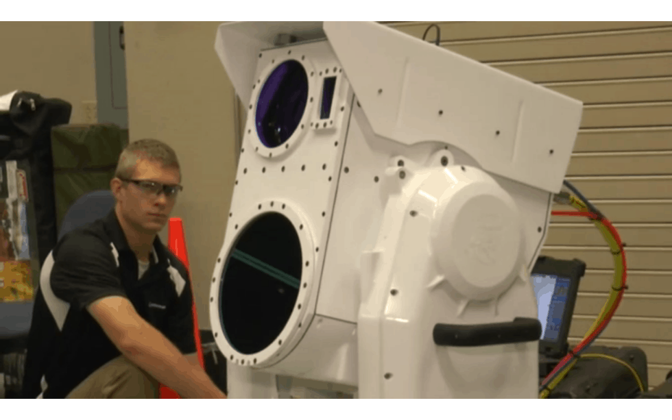 Boeing's new laser fits in suitcases and shoots down drones - Americas ...