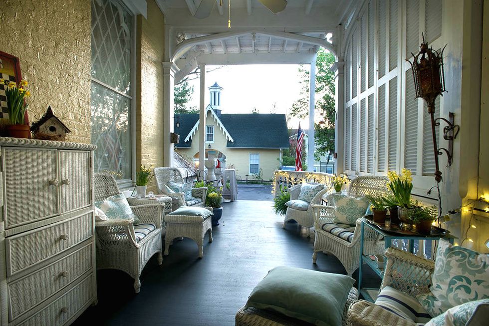 This Gothic Revival inn looks like something from a magazine and it's ...