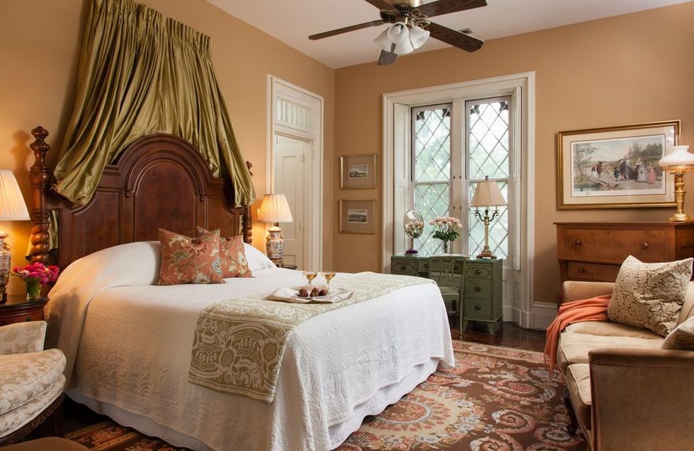 This Gothic Revival inn looks like something from a magazine and it's ...