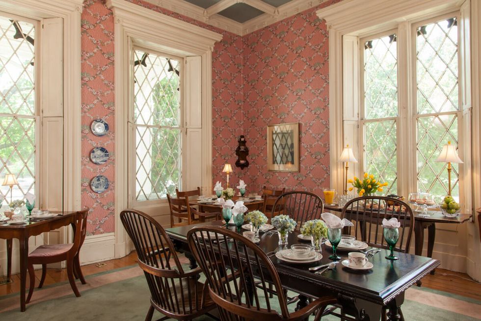 This Gothic Revival inn looks like something from a magazine and it's ...