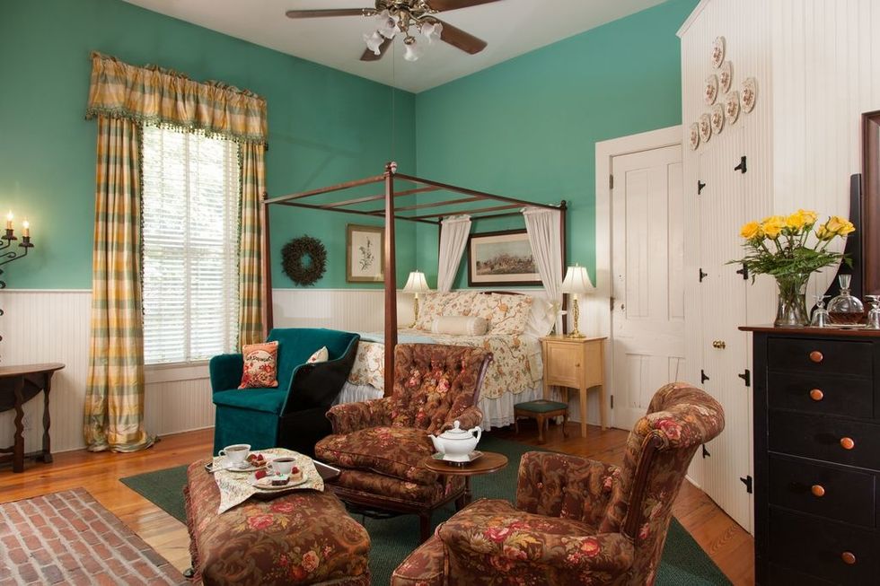 This Gothic Revival inn looks like something from a magazine and it's ...