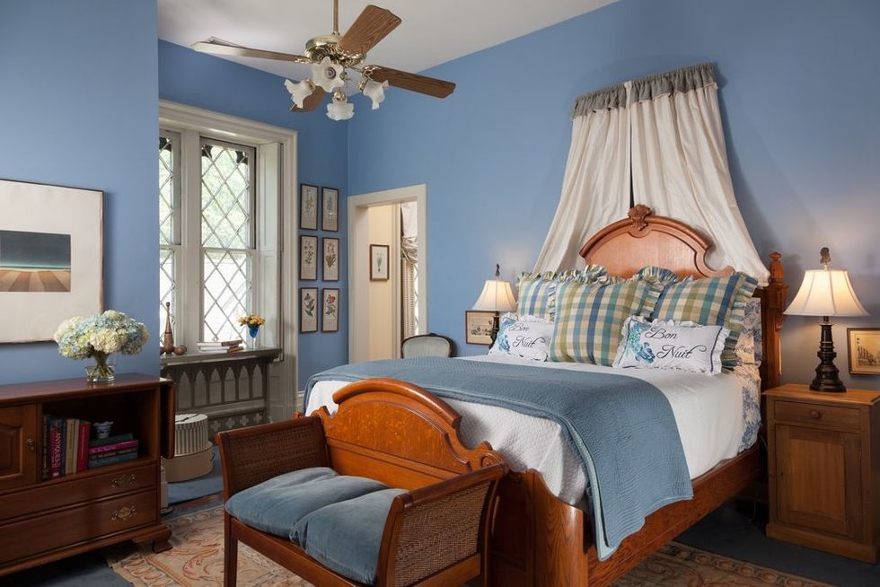 This Gothic Revival inn looks like something from a magazine and it's ...