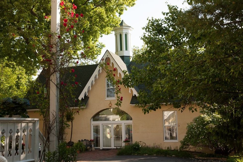 This Gothic Revival inn looks like something from a magazine and it's ...