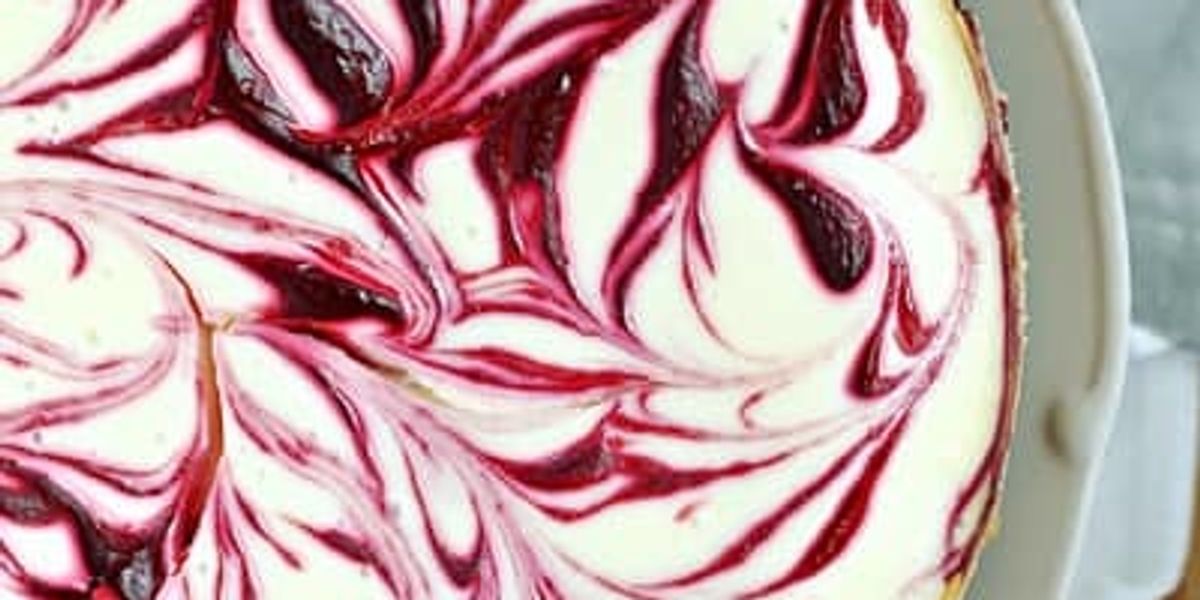 White Chocolate Raspberry Swirl Cheesecake | Let's Dish Recipes - My ...