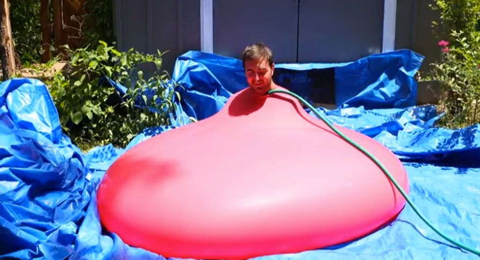 Must see moment when this six-foot water balloon with a grown man ...