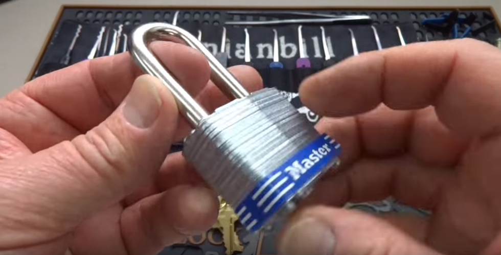 Video shows shockingly easy way to break open a Master Lock with just a ...