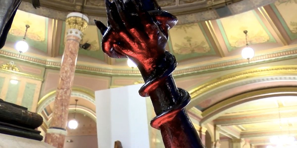 Satanic Temple display placed next to Nativity scene, menorah in ...