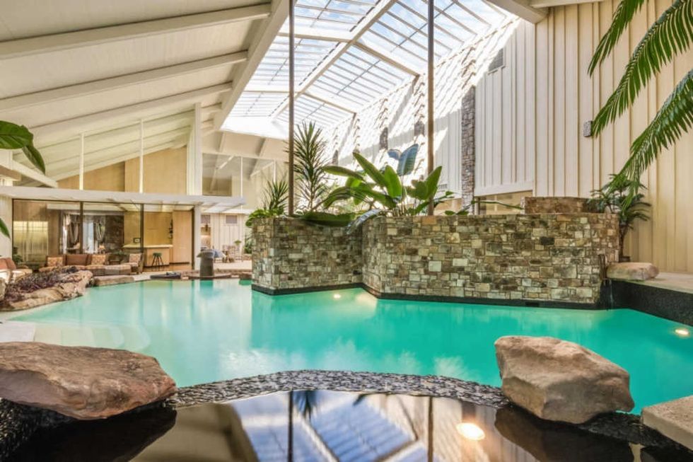 A mansion with 15 bathrooms and indoor pool is on the market in ...