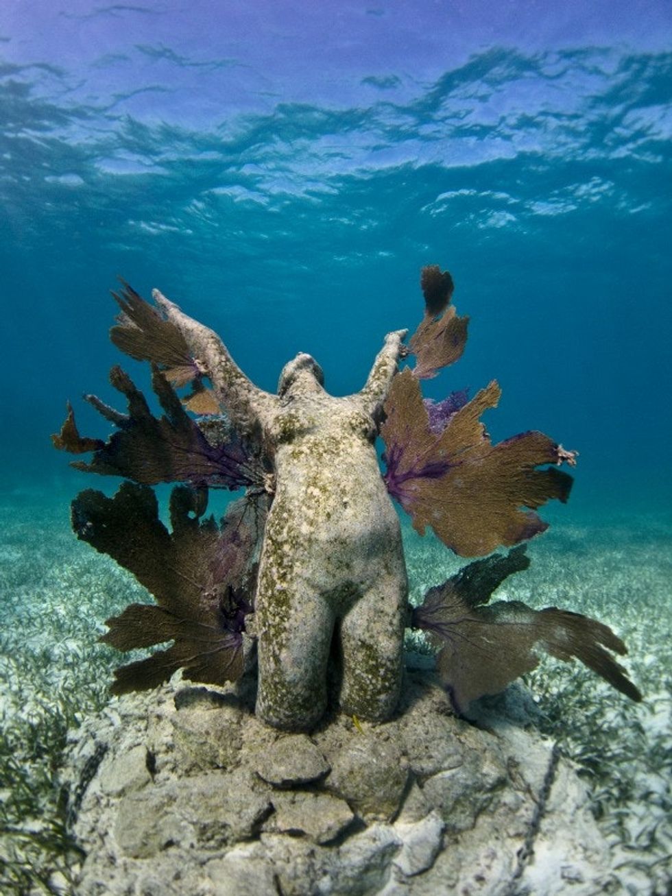 Creepy? Yes. Beautiful, too. These underwater statues may help save our ...