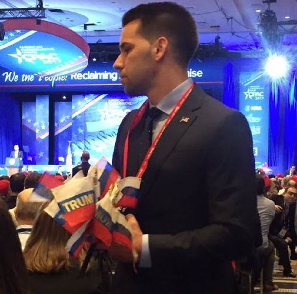 Pranksters Hand Out Russian ‘Trump’ Flags At Conservative Conference - GOOD