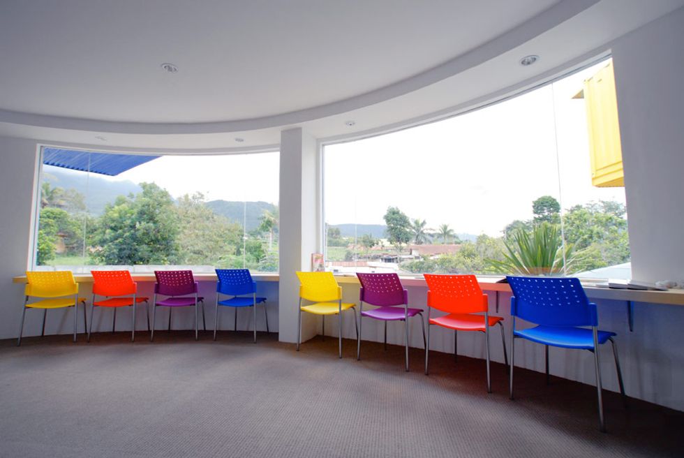 A Stunning Library and Clinic Made From Shipping Containers - GOOD