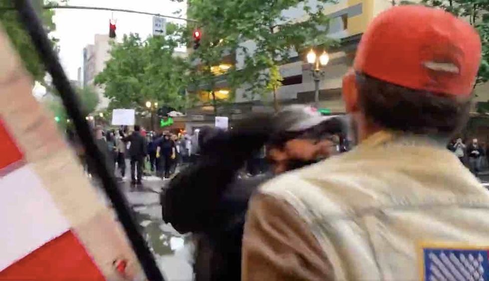 Videos show violent protesters ganging up on and knocking out lone ...