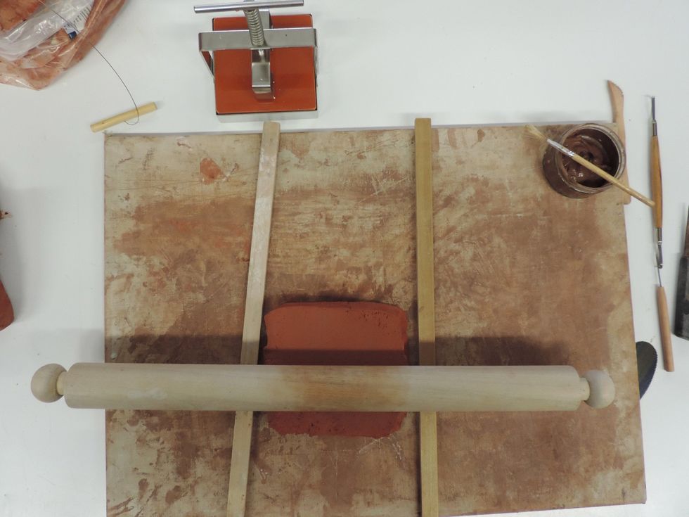 How to roll out a clay slab tile for wall installation - B+C Guides
