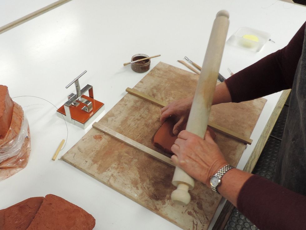 How to roll out a clay slab tile for wall installation - B+C Guides