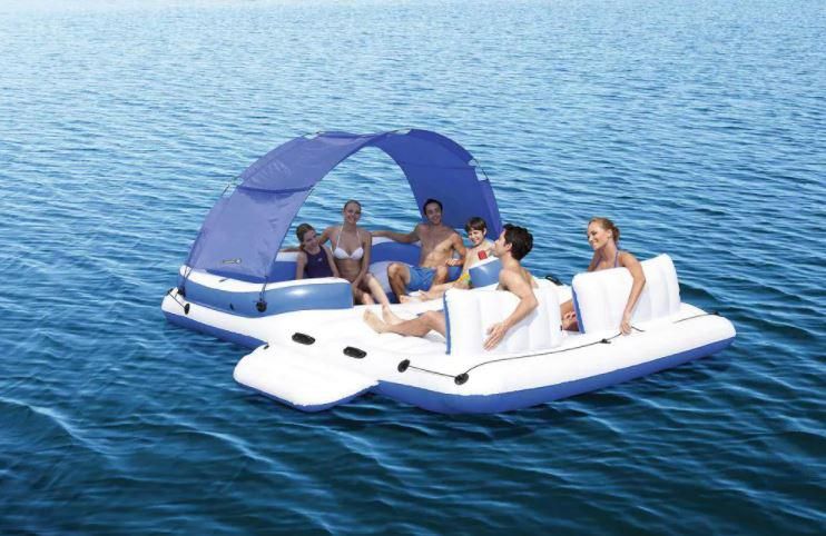 This floating island raft has everything you need for a perfect day at ...