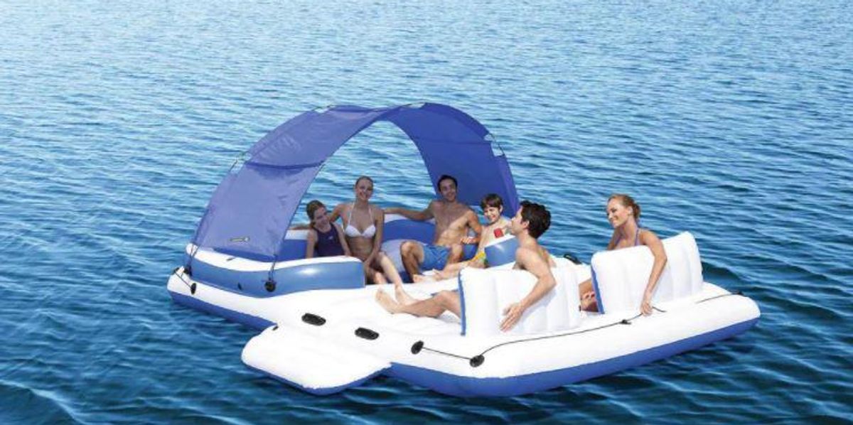 This floating island raft has everything you need for a perfect day at ...