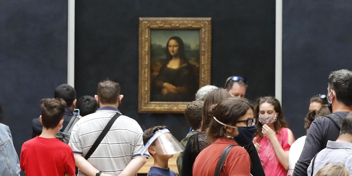 Mona Lisa Caked by Man Disguised as Old Lady in Wheelchair - PAPER Magazine
