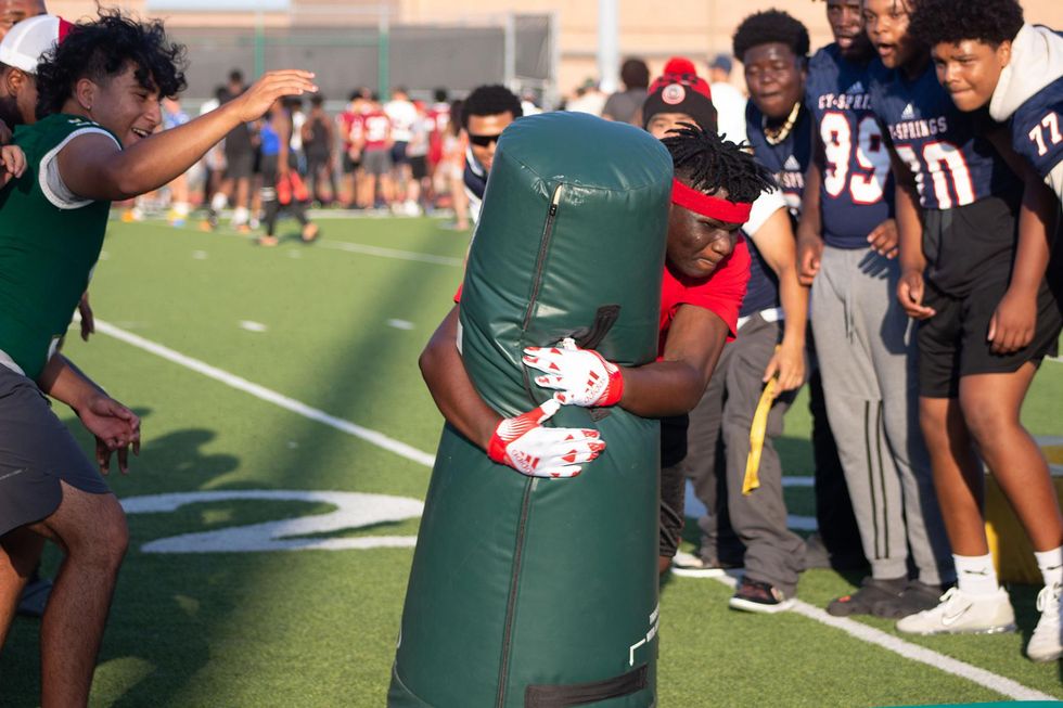 CFISD: Football players lead first districtwide camp for LIFE Skills ...