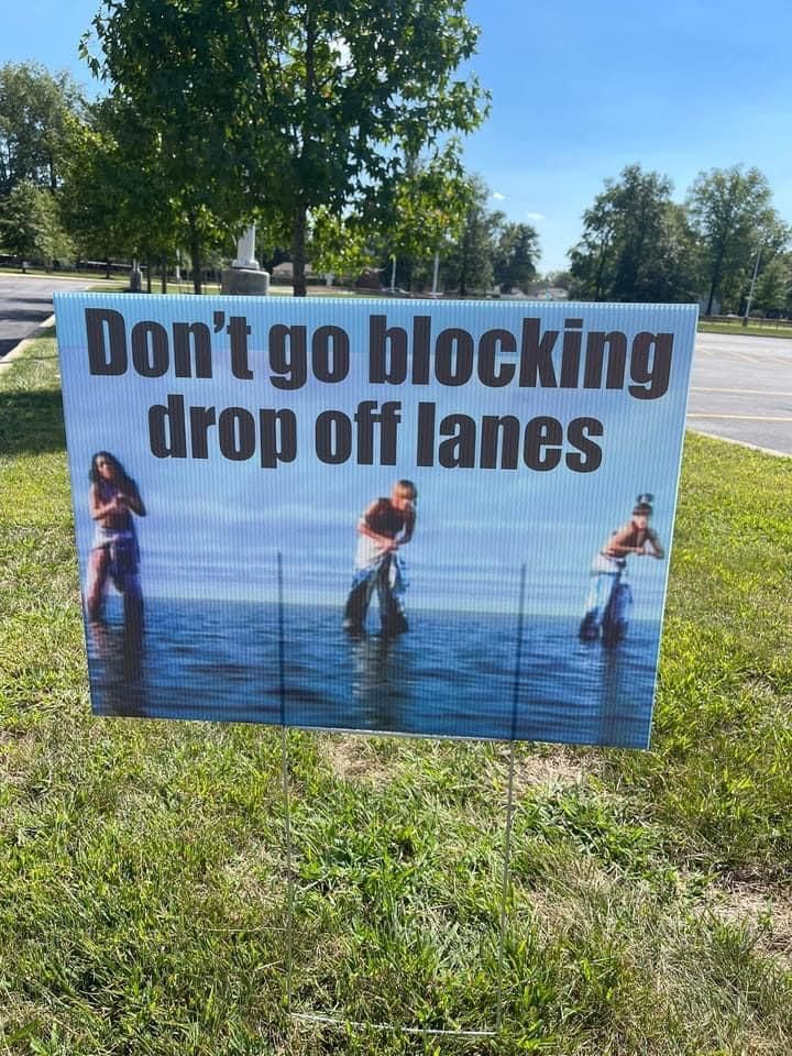 Ohio elementary school shares hilarious drop-off lane signs - Upworthy