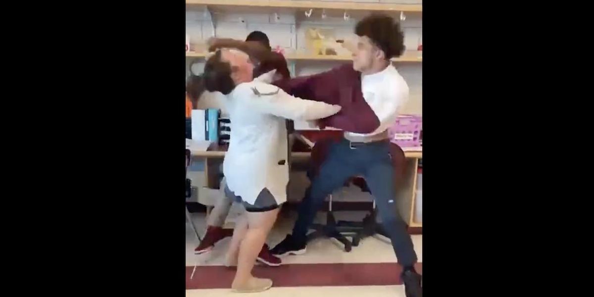 Video: Teacher punched in face, knocked to floor as she tries to break ...