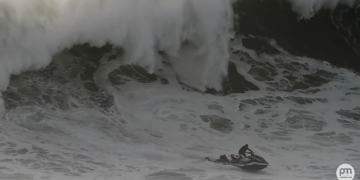 Video shows man on jet ski rescuing surfer from 100-foot wave - Upworthy