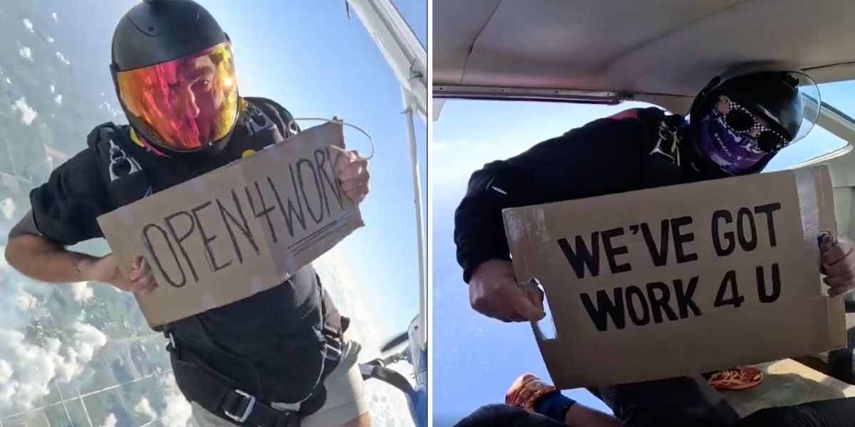 Guy skydives with sign saying 'Open4Work' after losing job - Upworthy
