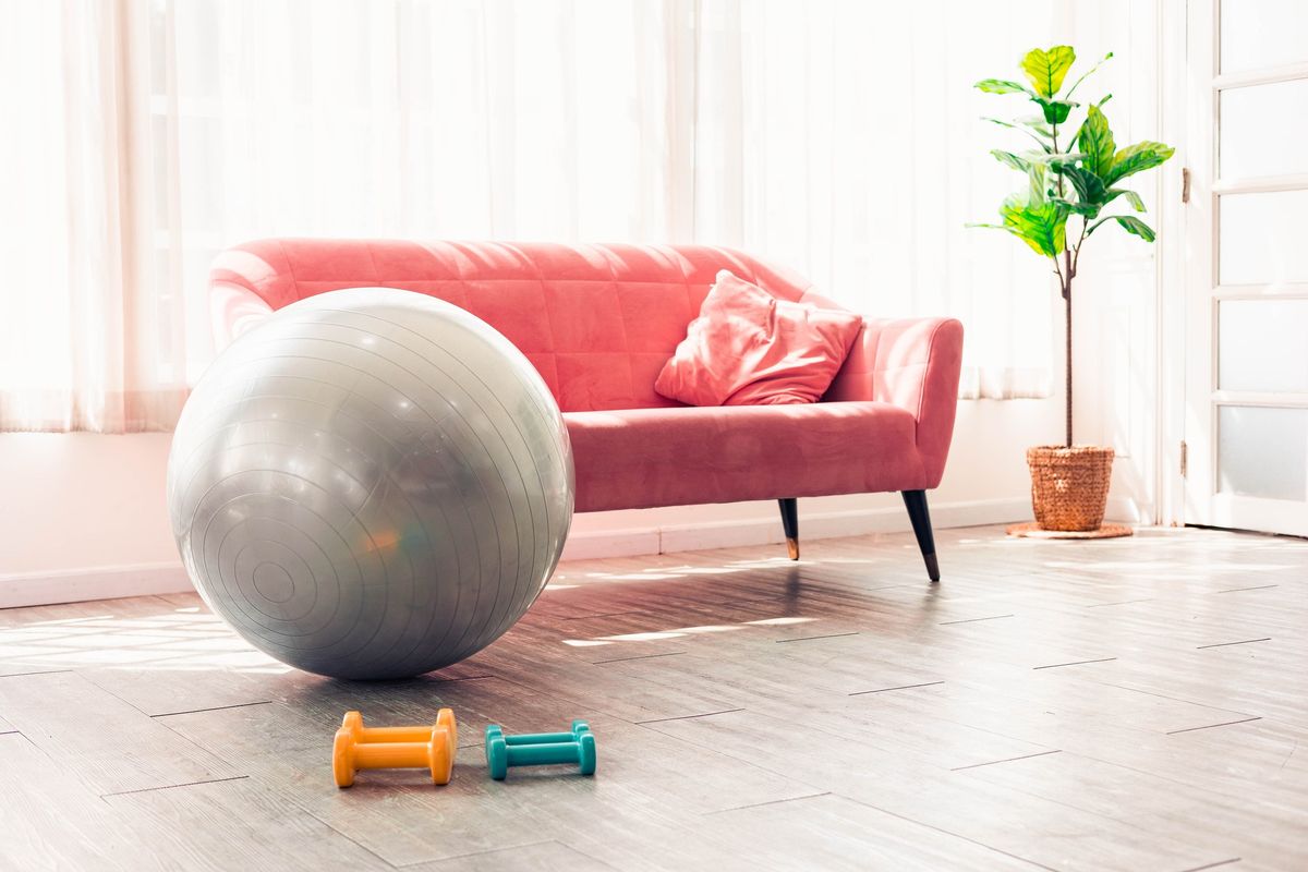4. Work on an Exercise Ball - xoNecole