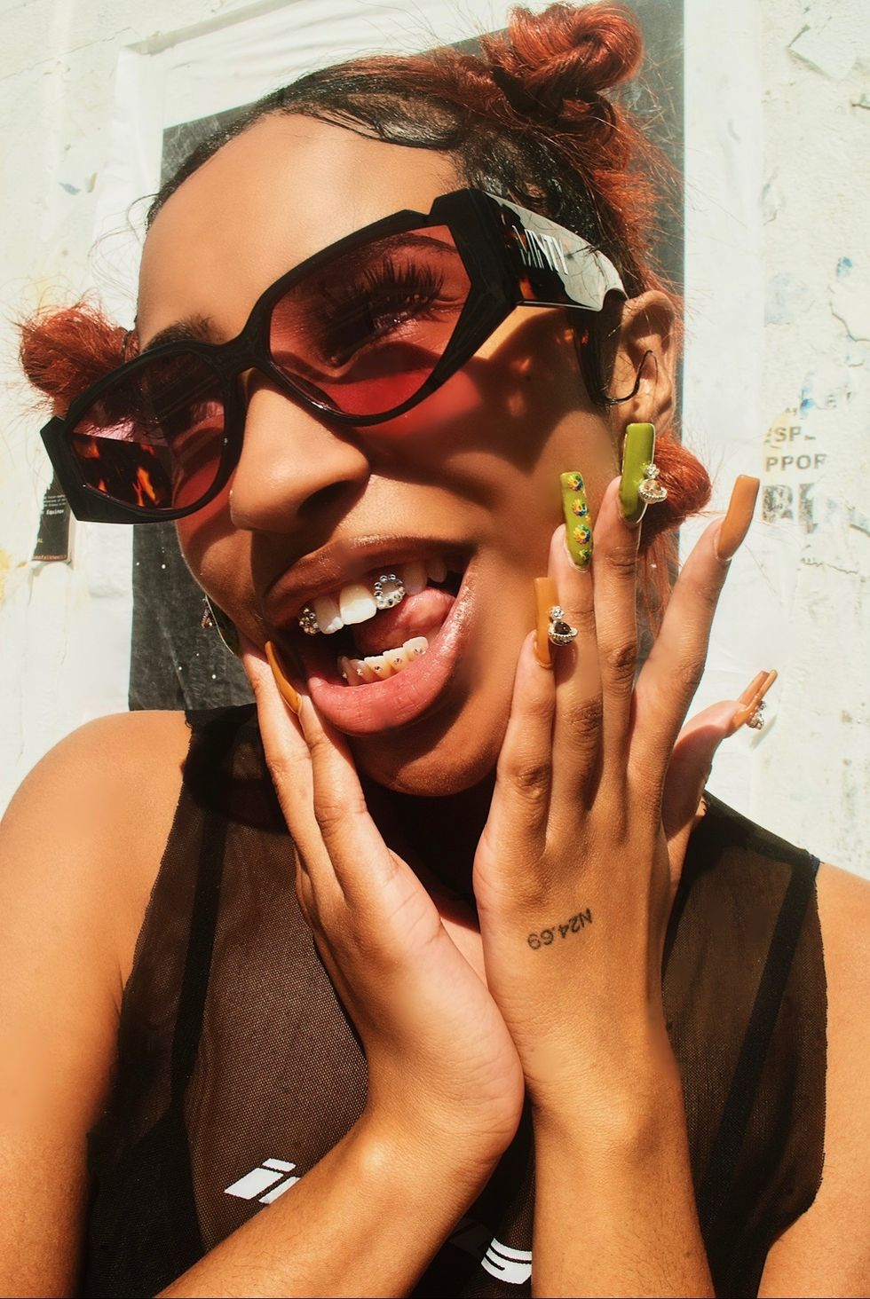 Everything To Know About Tooth Gems - xoNecole