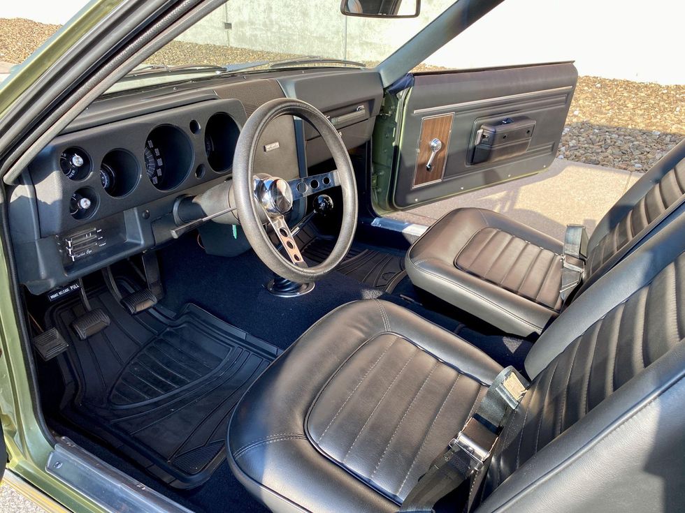 A performance-modified AMC Javelin, showroom-fresh Ford Thunderbird ...