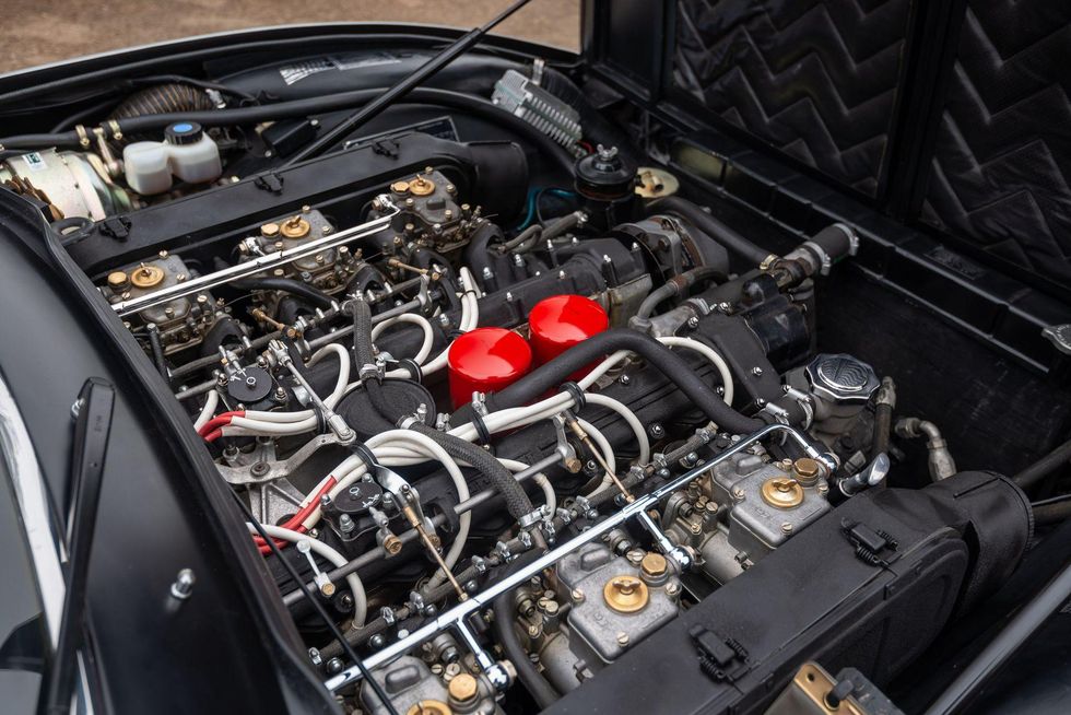 A V-12 Ferrari 365 GTC4, turbocharged Chevrolet Corvair, and Ford ...