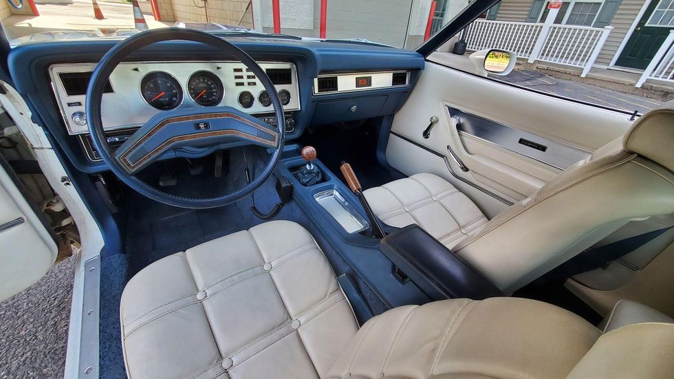 A V-6 Ford Mustang Cobra II, upgraded Toyota Land Cruiser, and GMC ...