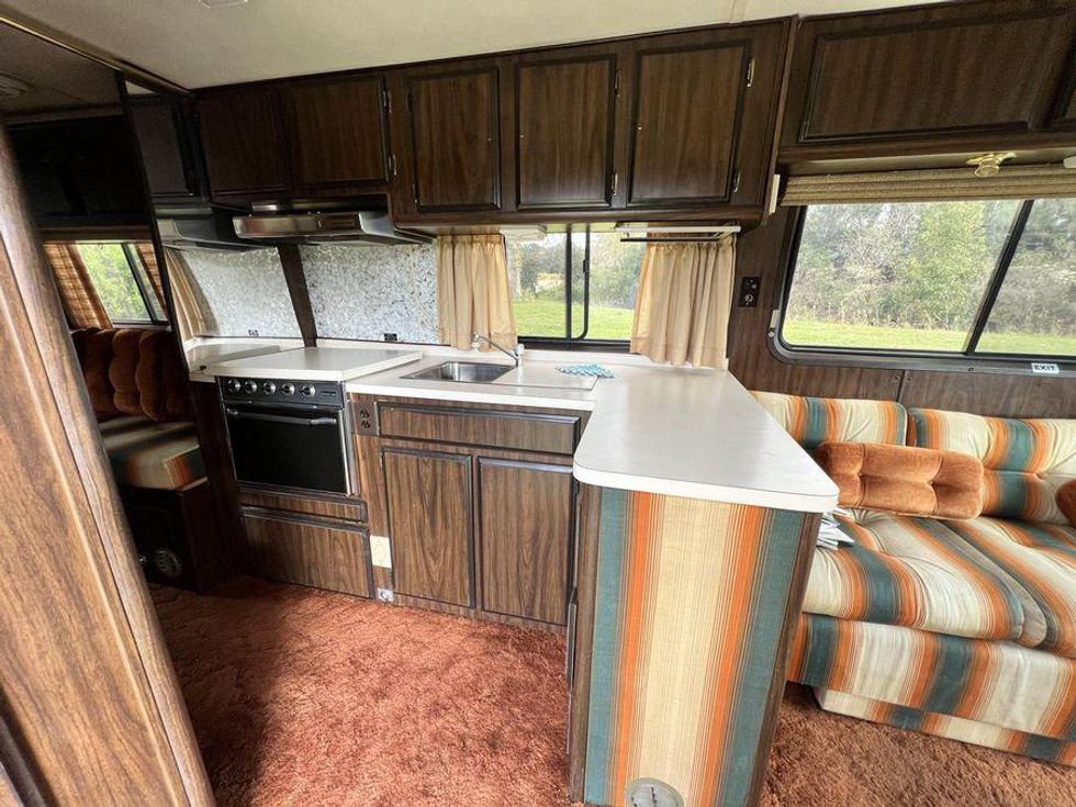 Down to the Tupperware inside, 1977 Dodge Travco motorhome unabashedly ...