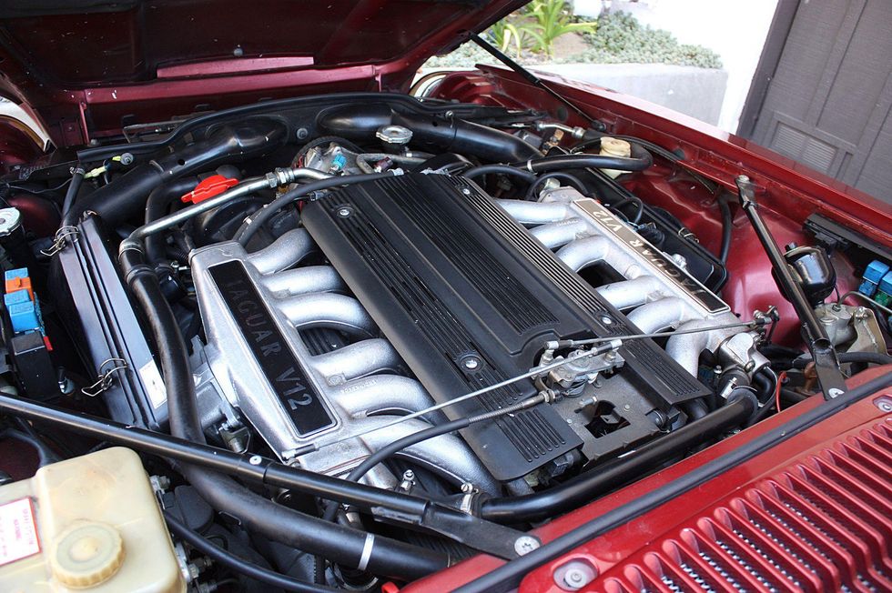 A 12-cylinder Jaguar XJS convertible, Ford Model A Delivery Car, and ...