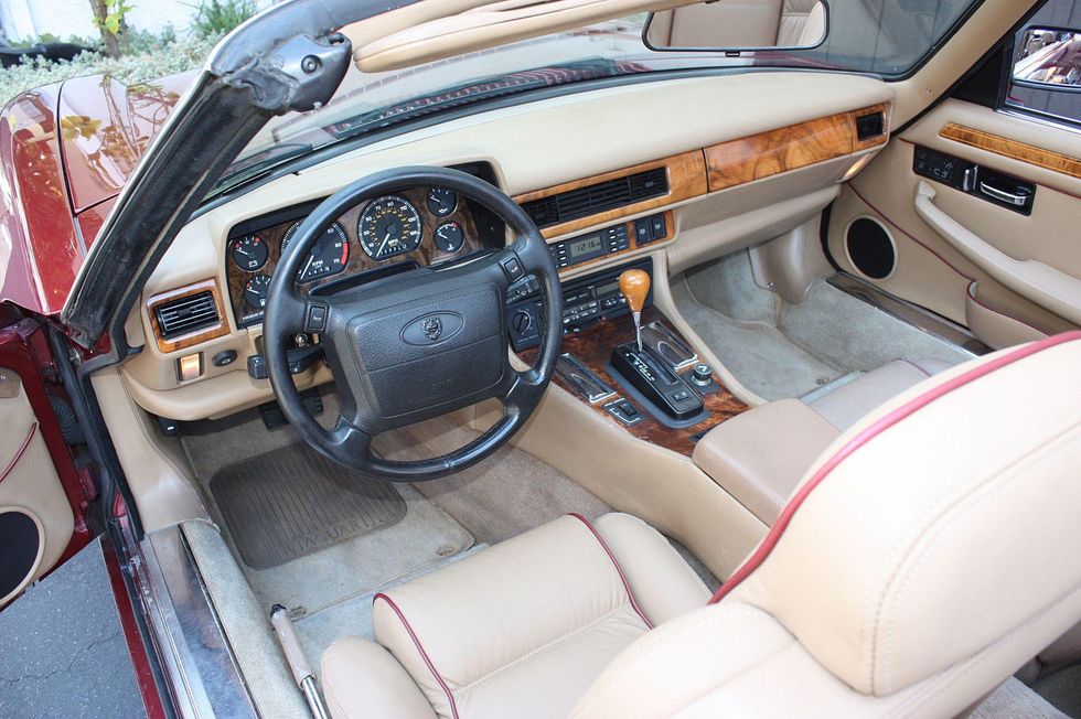 A 12-cylinder Jaguar XJS convertible, Ford Model A Delivery Car, and ...