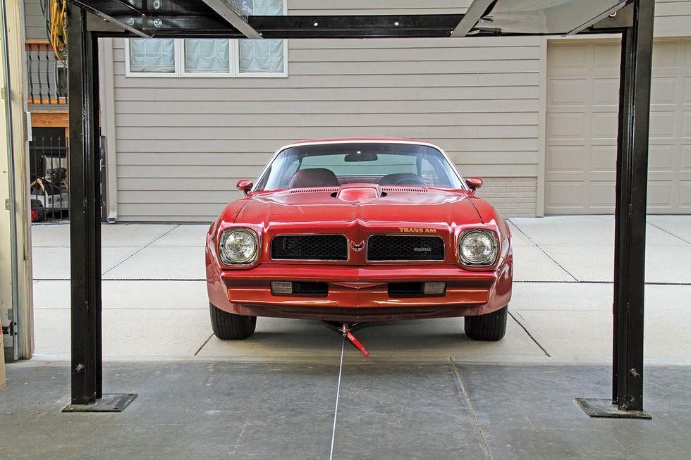 Installing an electric winch in your garage makes moving vehicles easy ...